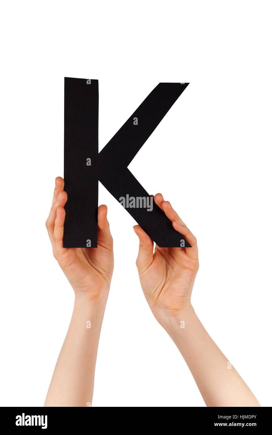 the letter K, hold by hands, isolated Stock Photo - Alamy