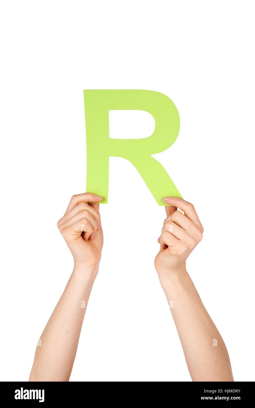 the letter R, hold by a hand, isolated Stock Photo - Alamy
