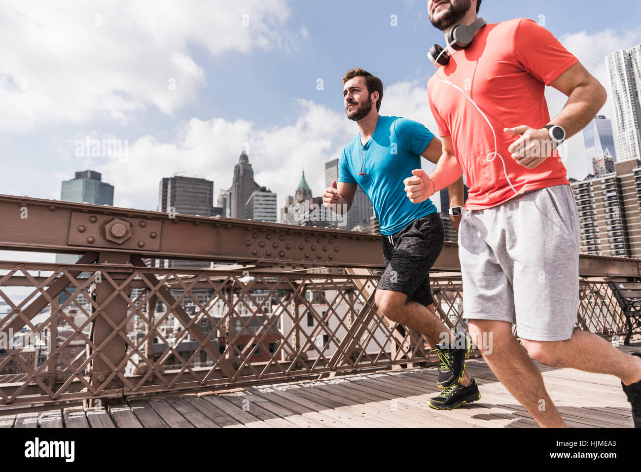 USA, New York City, two men running on Brooklyn Brige Stock Photo - Alamy