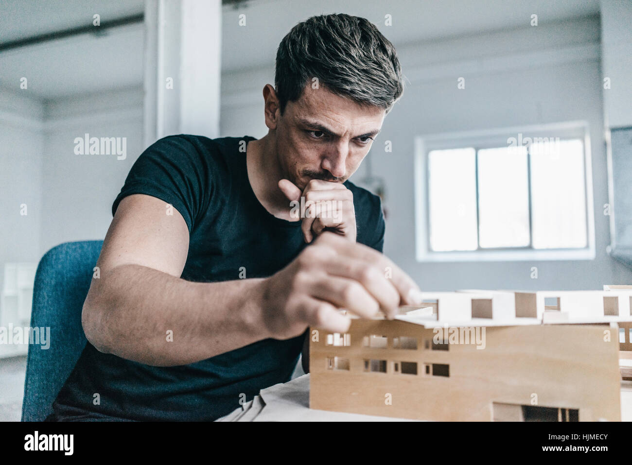 Architect working on architectural model Stock Photo - Alamy