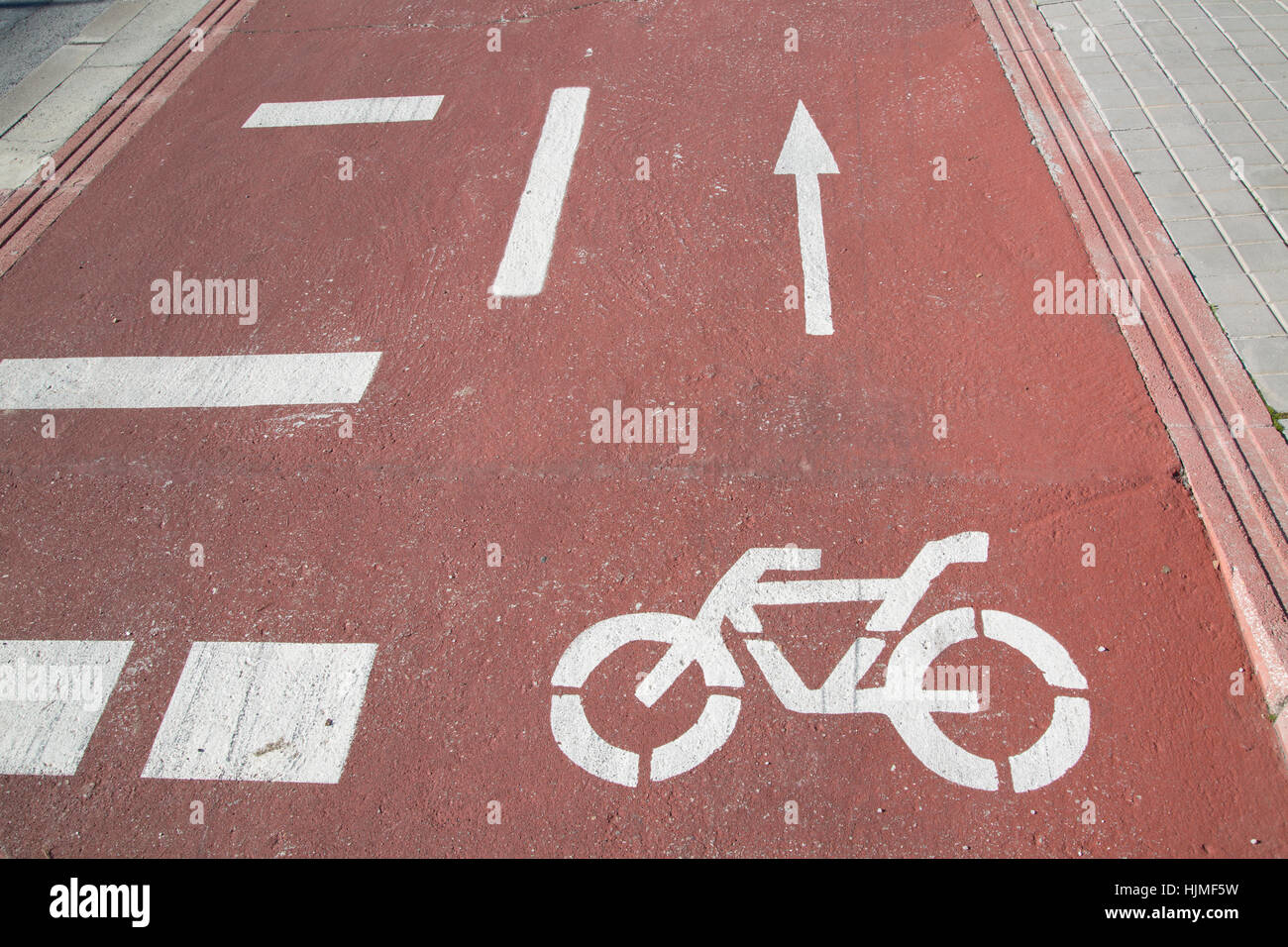 Bike Lane Symbol on Road Surface Stock Photo - Alamy