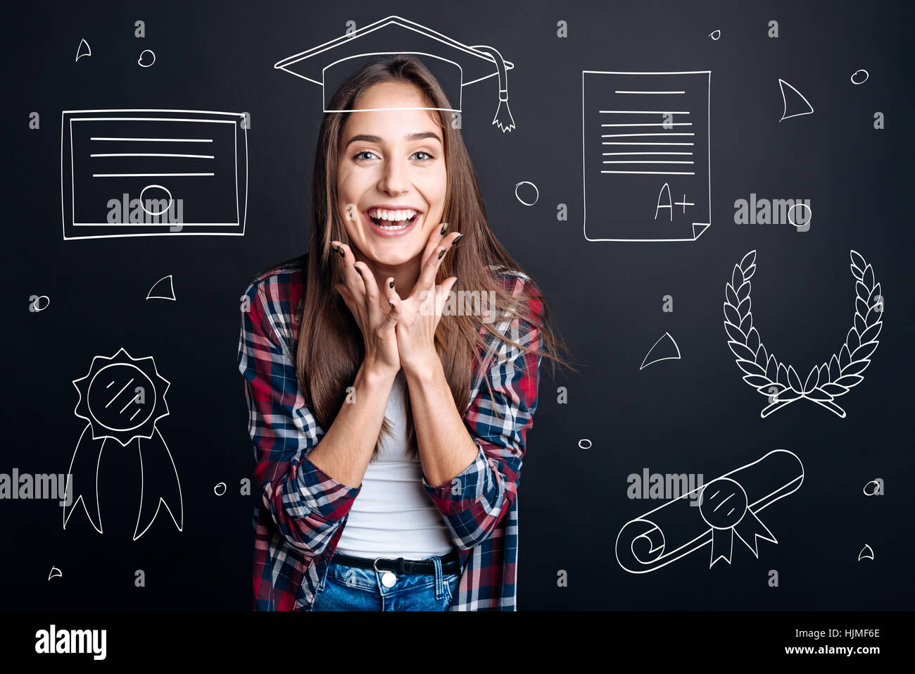 Positive graduate student celebrating graduation Stock Photo - Alamy