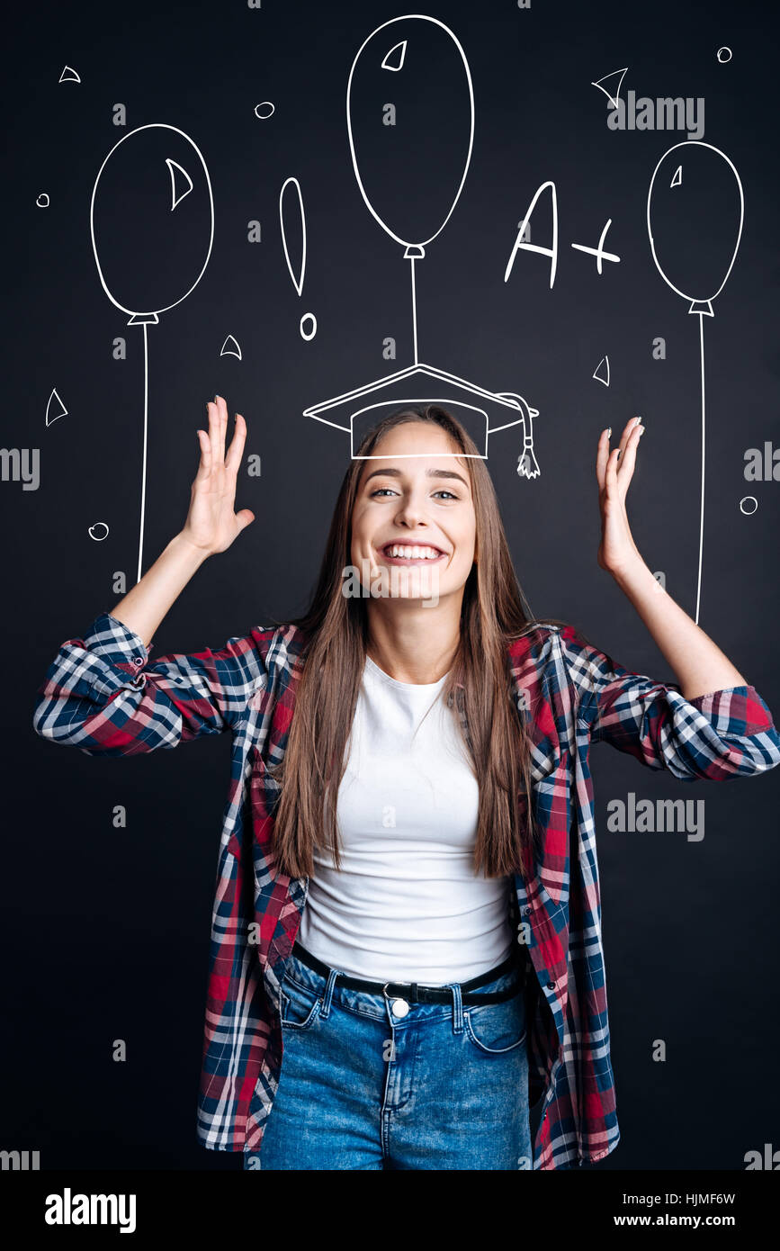 Happy graduate student celebrating celebration Stock Photo - Alamy