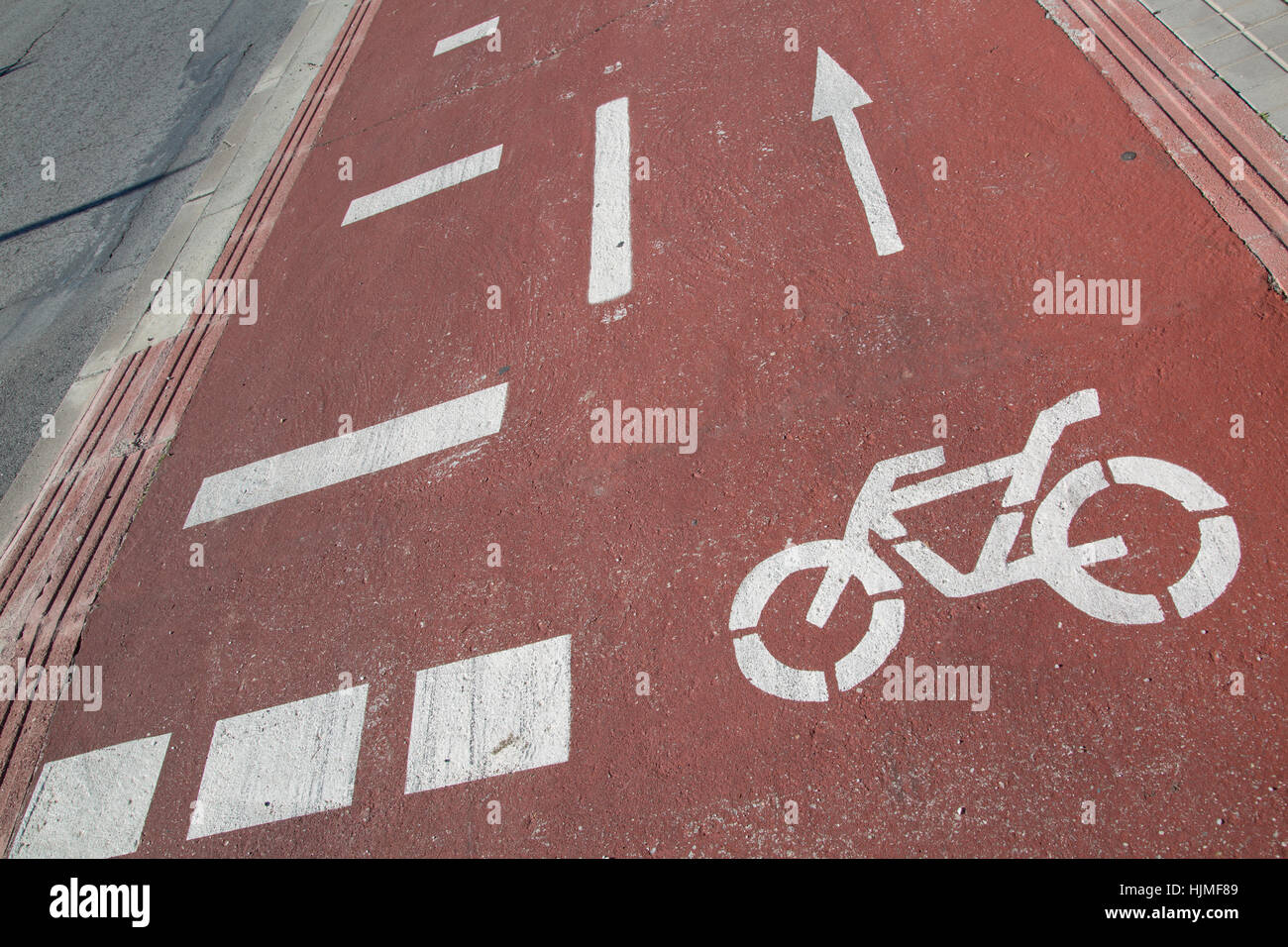 Bike Lane Symbol on Road Surface Stock Photo - Alamy