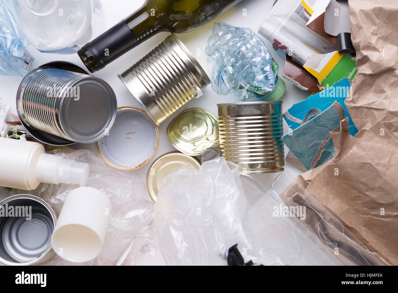 Trash lies on white table Stock Photo - Alamy