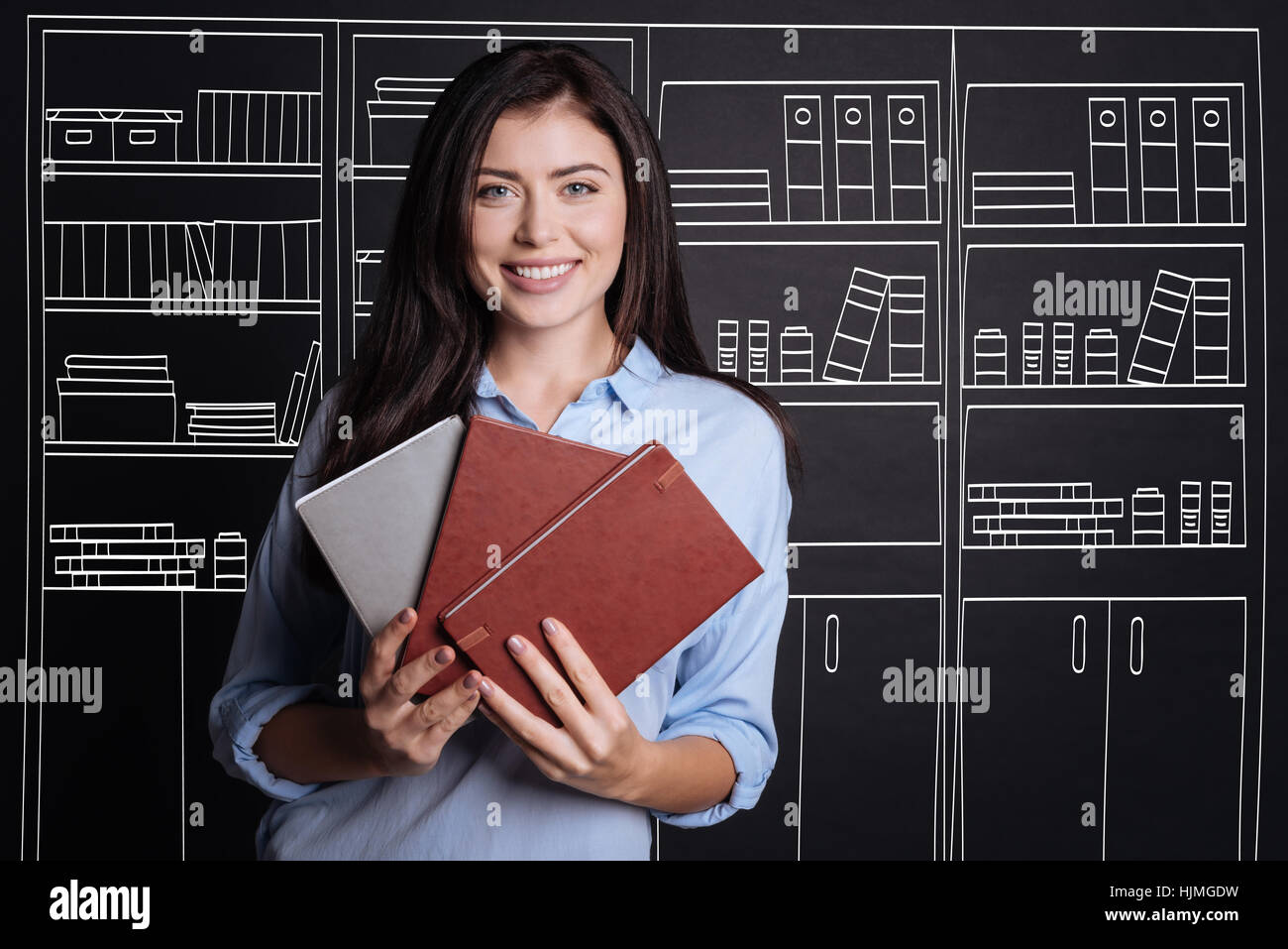 Cute female student notebooks hi-res stock photography and images - Alamy