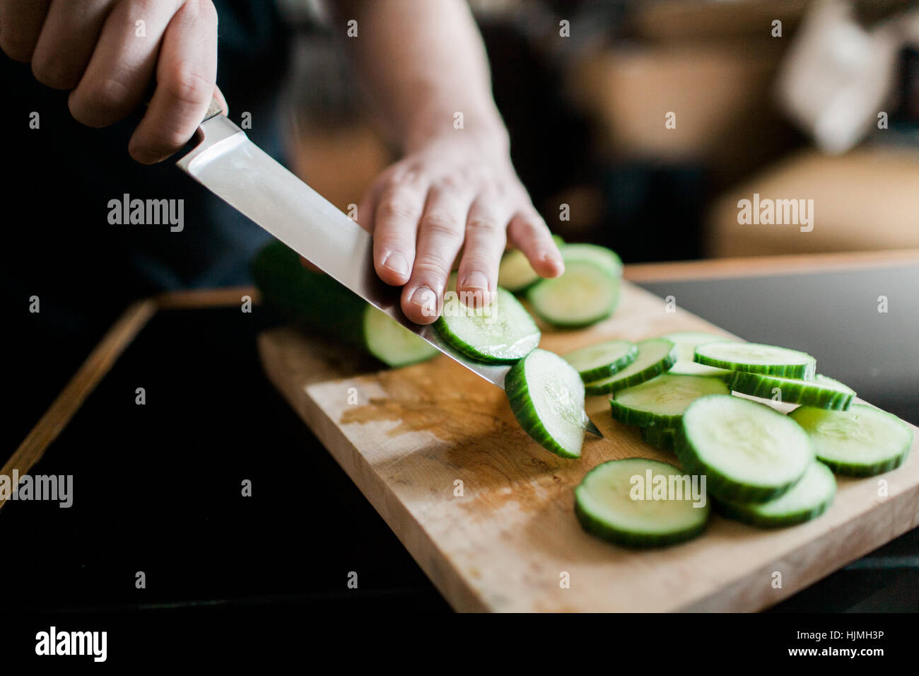 Cucumber cutting hi-res stock photography and images - Alamy