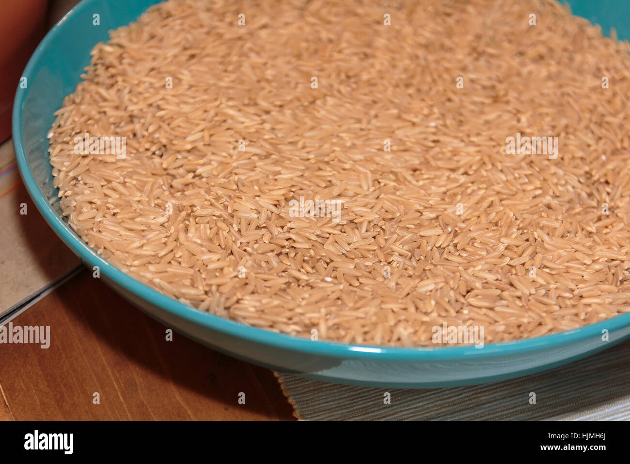 White Uncooked Rice inside Blue Bowl, Food Theme Stock Photo - Alamy