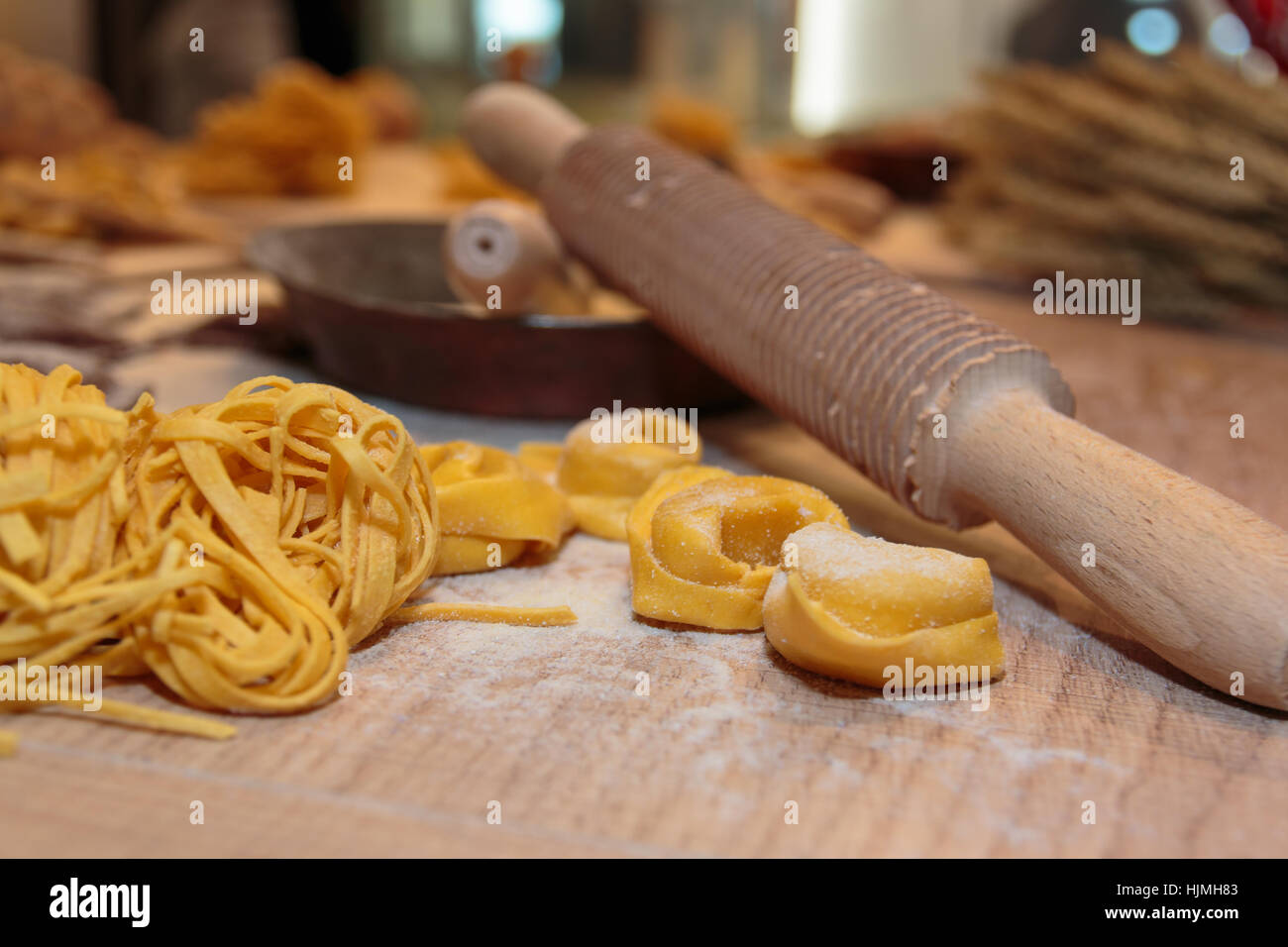 Tagliatelle and Tortellini Italian Pasta with Flour and Cutter Rolling ...