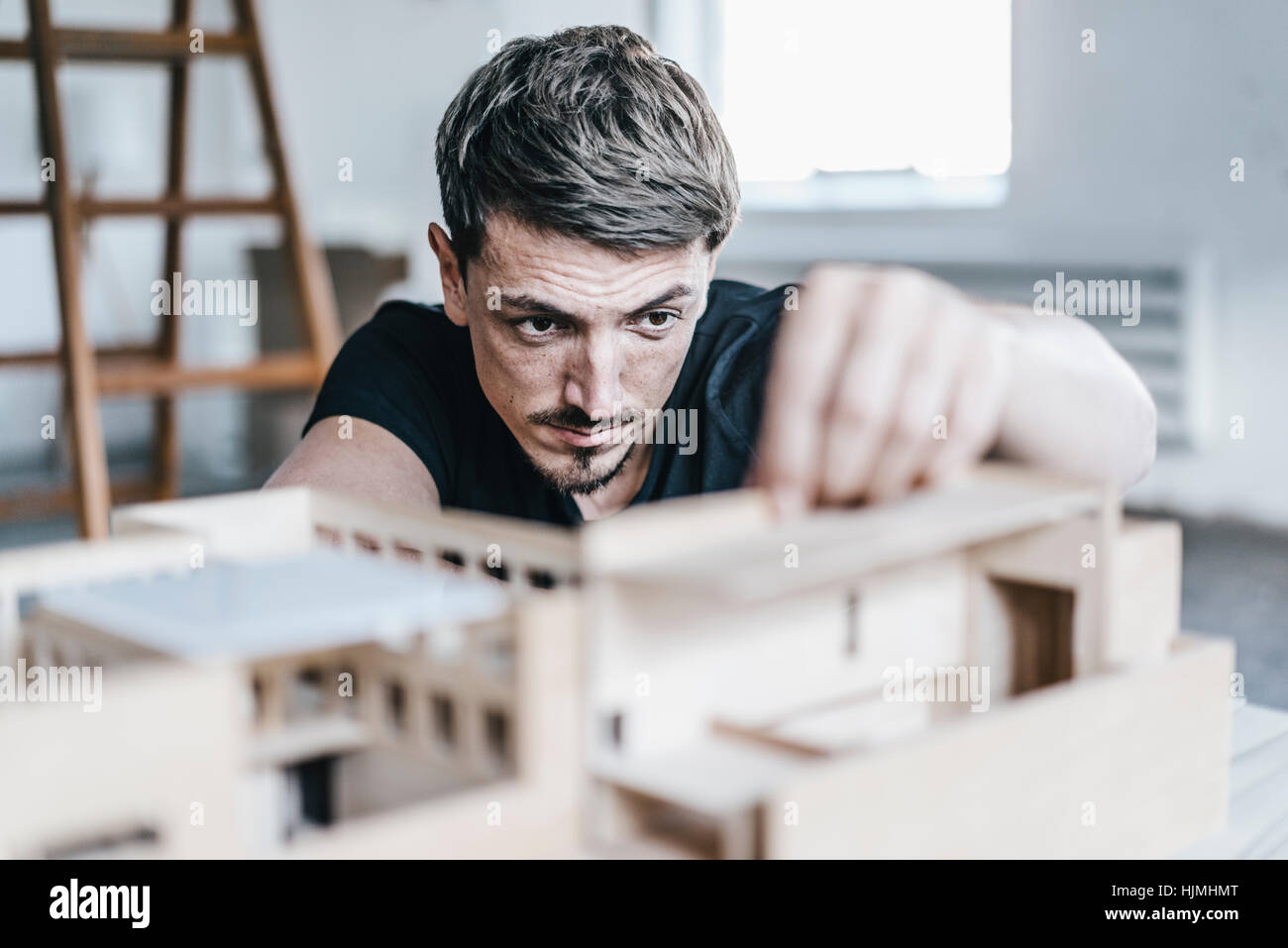 Architect working on architectural model Stock Photo - Alamy