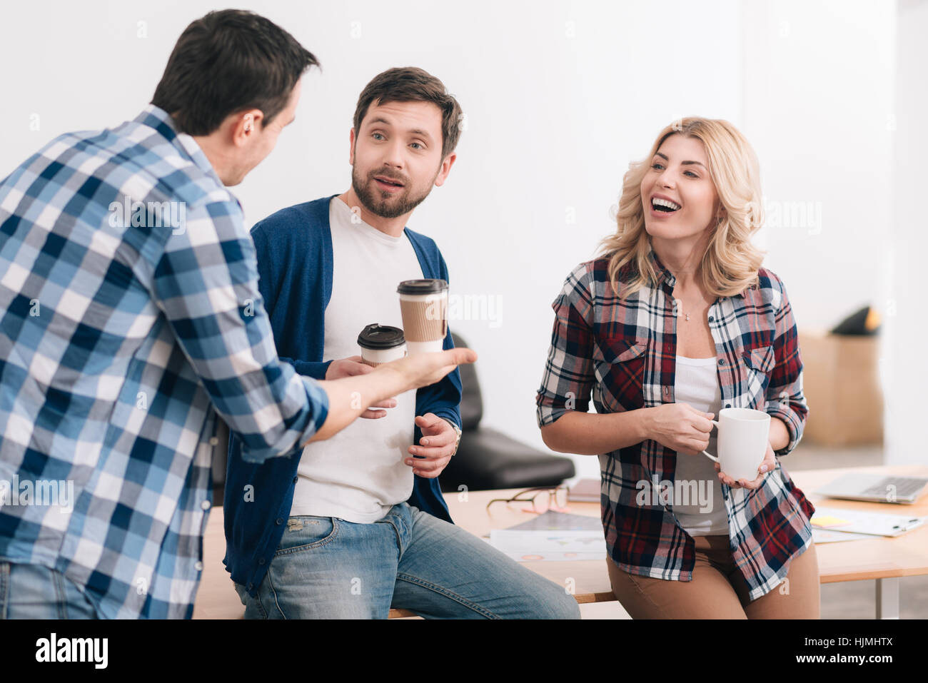 Nice friendly colleagues having a conversation Stock Photo - Alamy Nice friendly colleagues having a conversation Stock Photo - Alamy