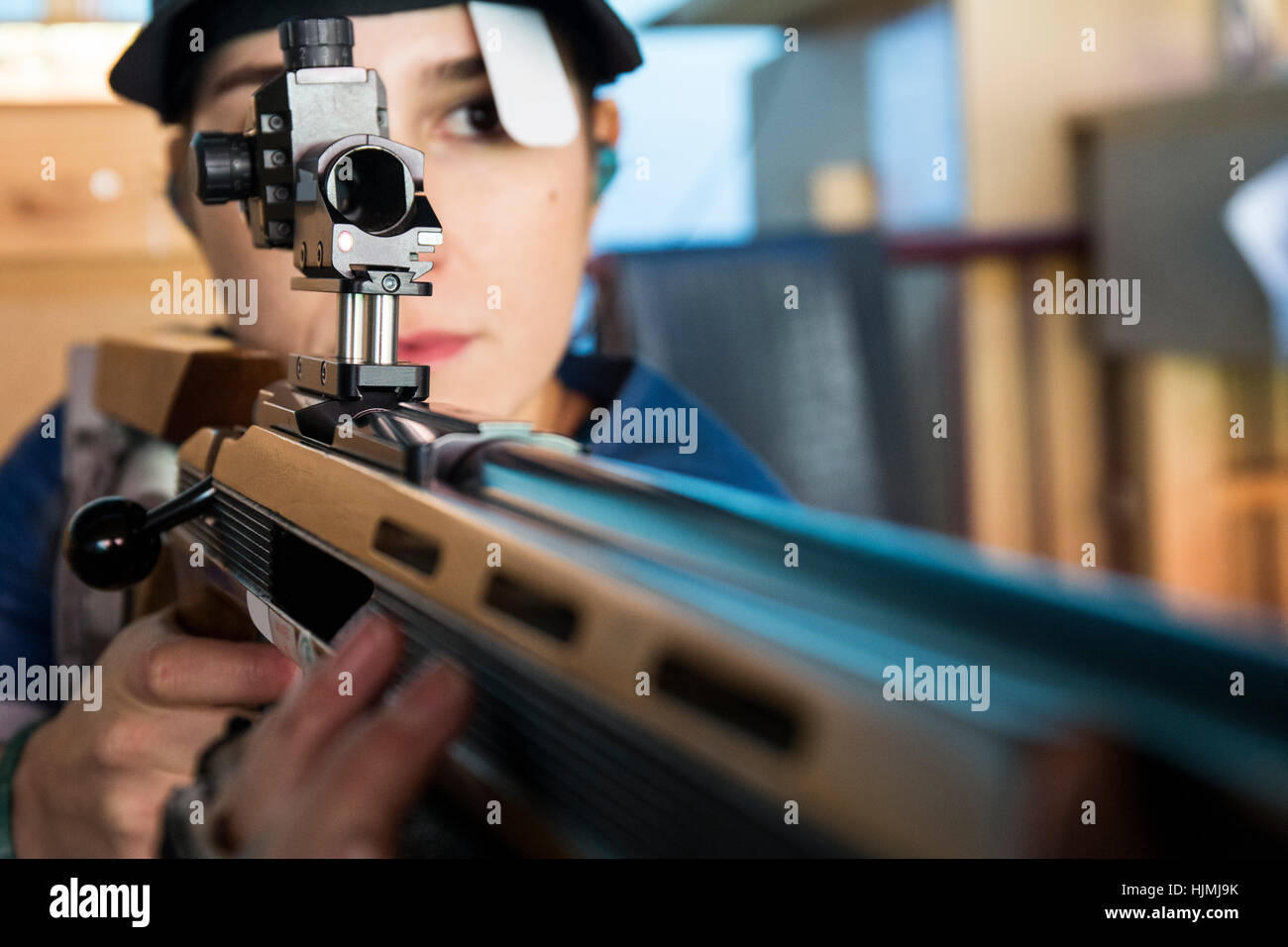 Woman sporting rifle aiming hi-res stock photography and images - Alamy