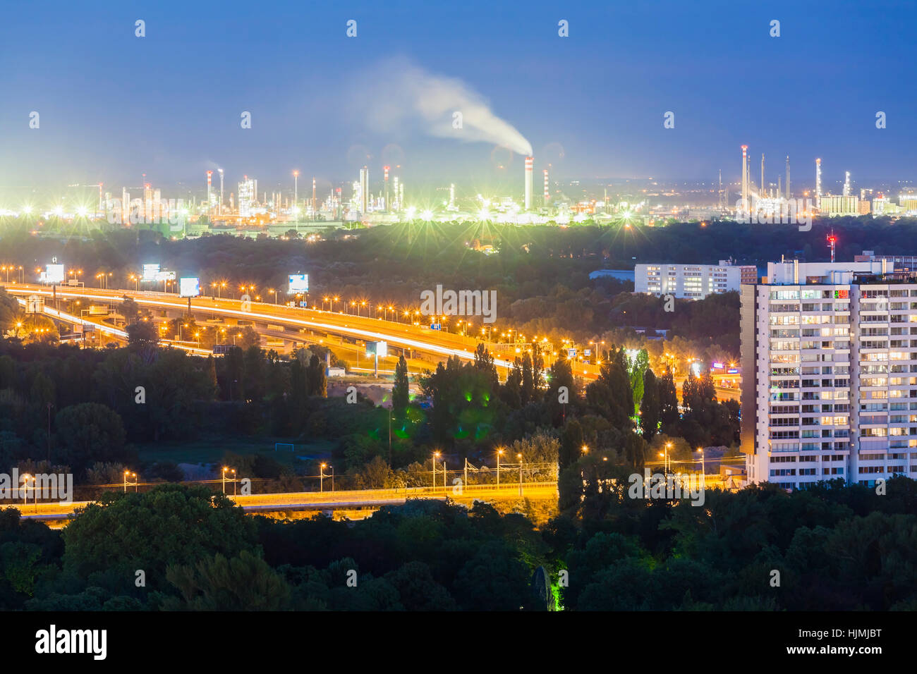 Slovakia, Bratislava, view to oil refinery and urban motorway at night ...