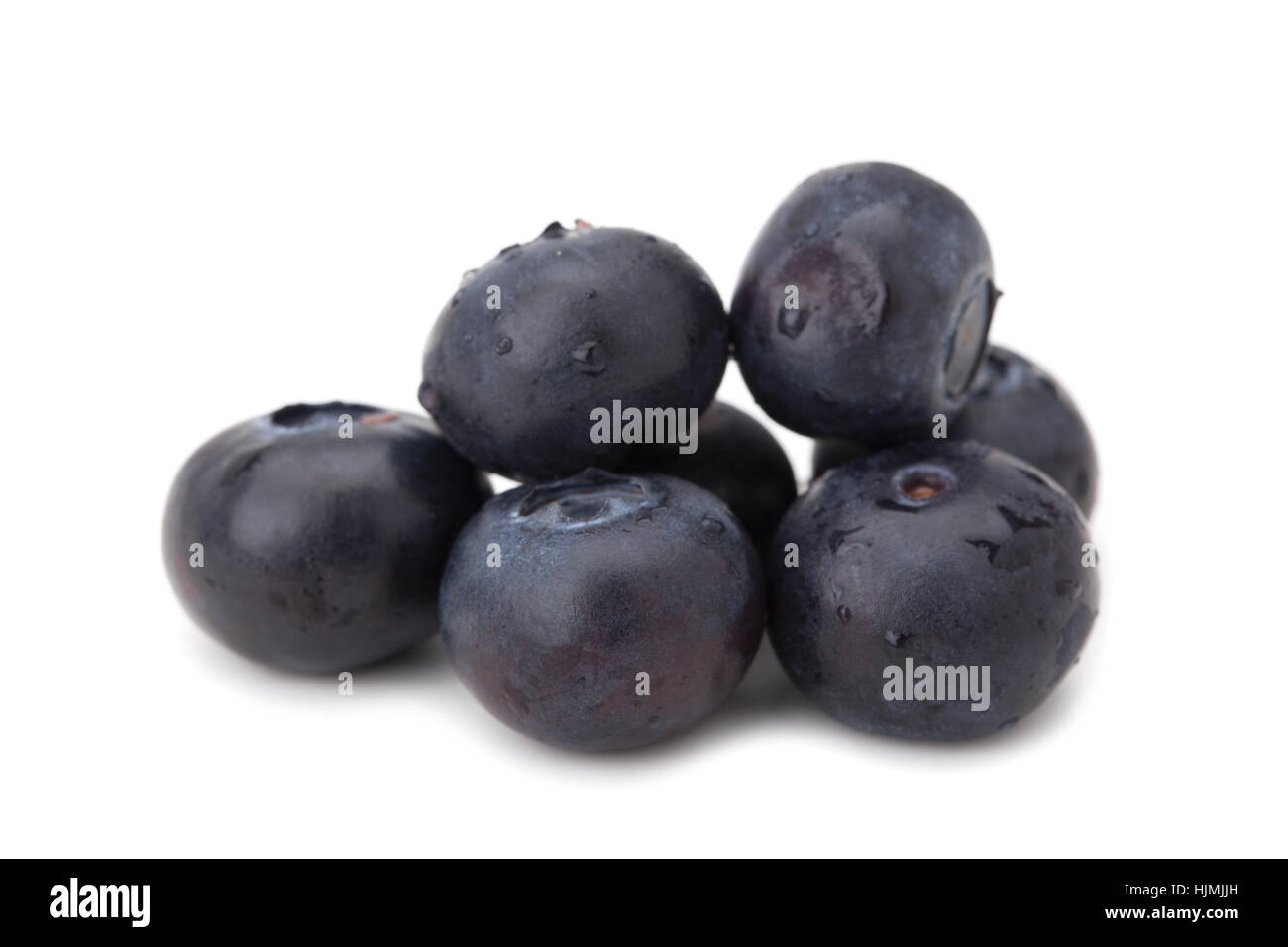 heap of ripe blueberry isolated on white background Stock Photo - Alamy