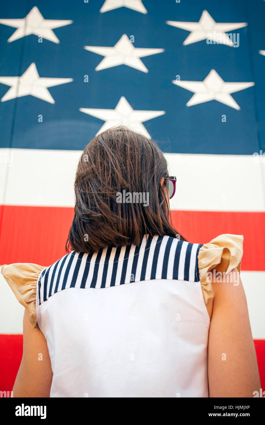 USA, back view of woman in front of Stars And Stripes Stock Photo - Alamy