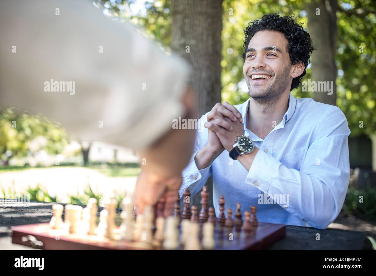 Laughing and playing chess hi-res stock photography and images - Alamy