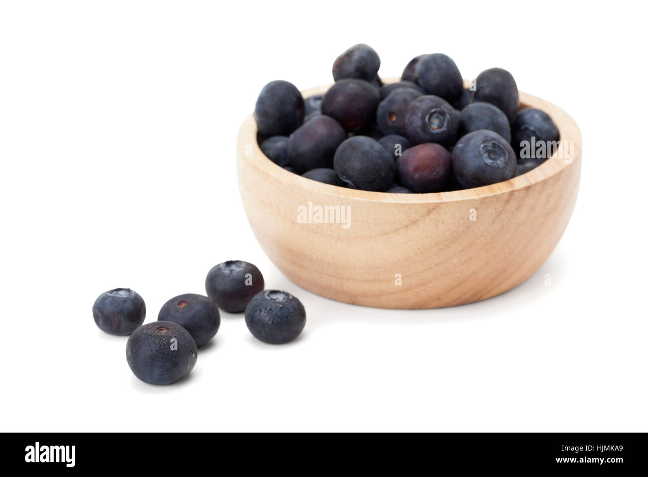 blueberry in wooden bowl isolated on white background with clipping ...
