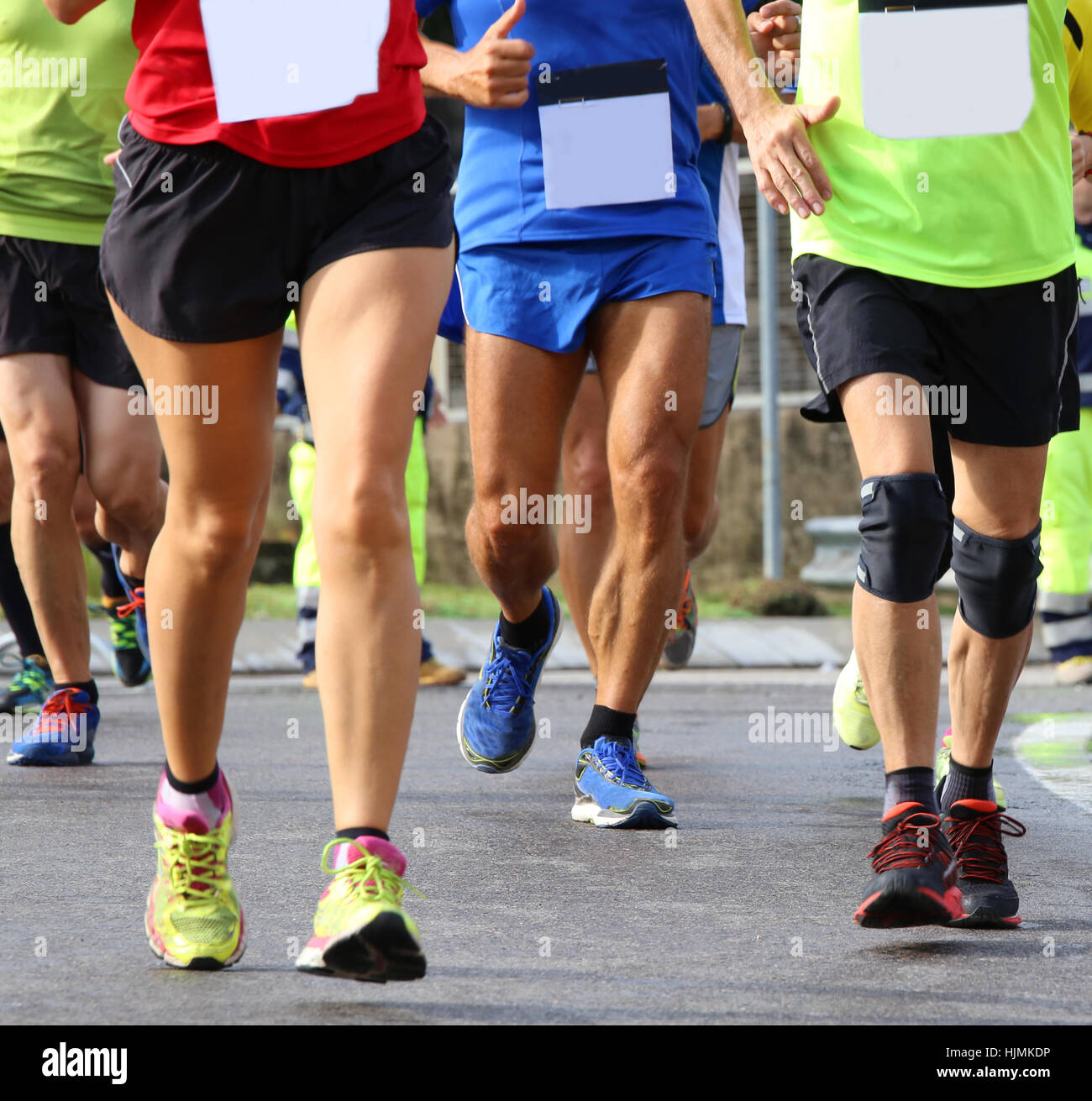 many people run fast during sports race through the streets Stock Photo ...