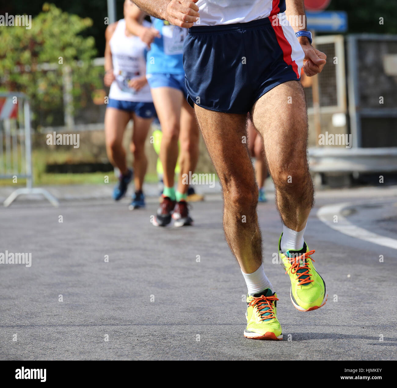 Muscular legs athletes running hi-res stock photography and images - Alamy
