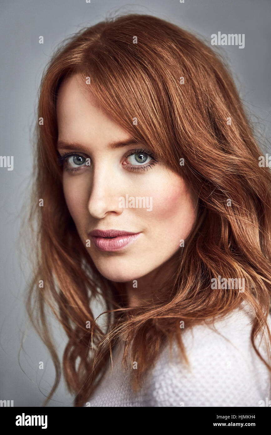 Portrait of redheaded woman Stock Photo - Alamy