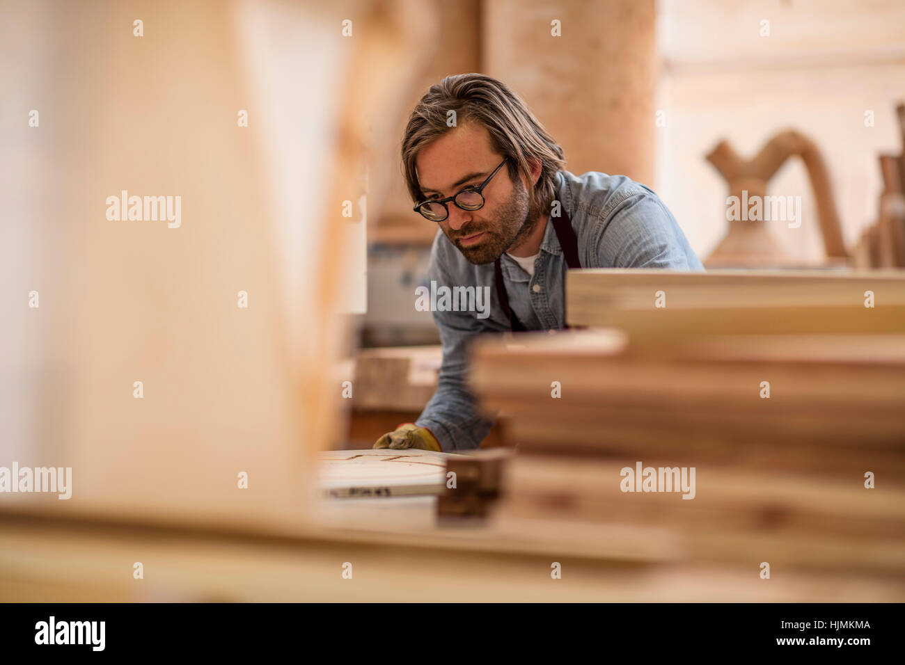 Craftsman working in wood work Stock Photo - Alamy