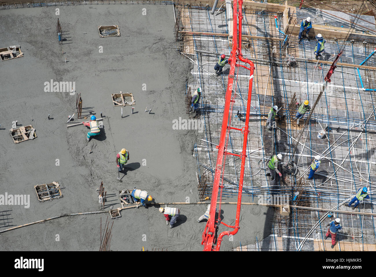 Construction workers at work Stock Photo - Alamy
