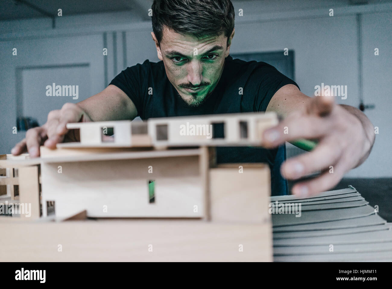 Architect working on architectural model Stock Photo - Alamy