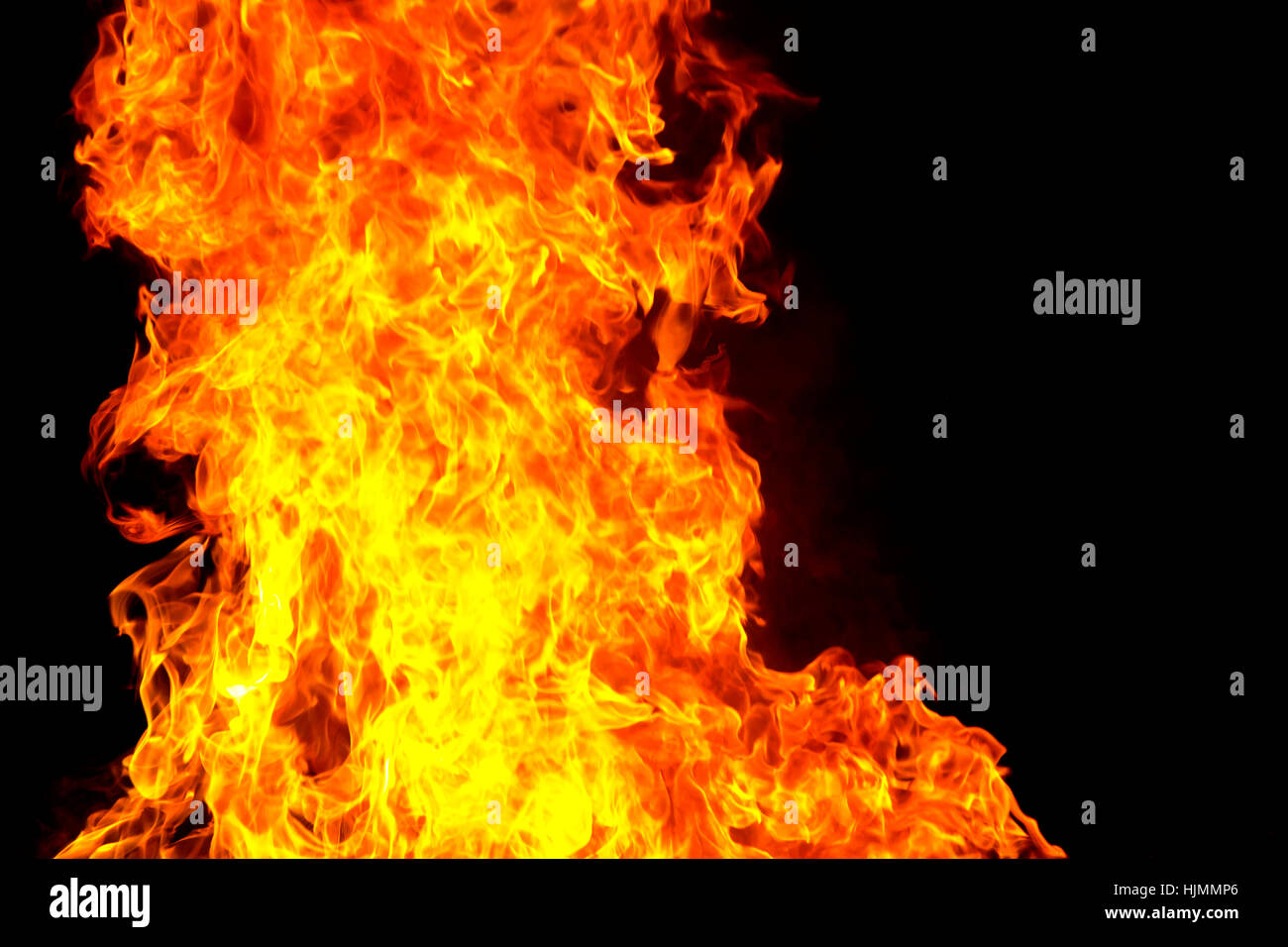 Photo of red fire flame on black background Stock Photo - Alamy