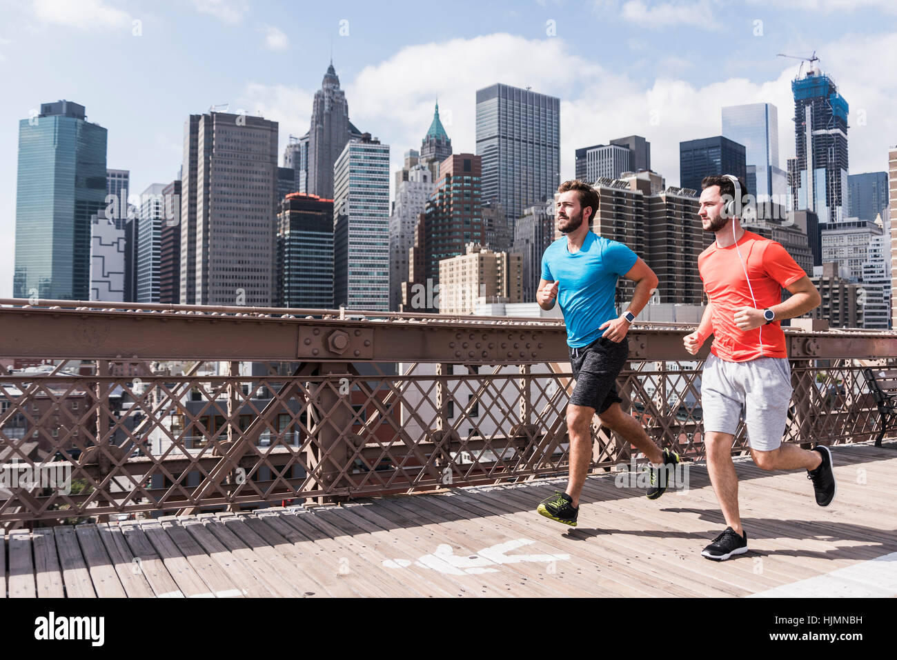 USA, New York City, two men running on Brooklyn Brige Stock Photo - Alamy