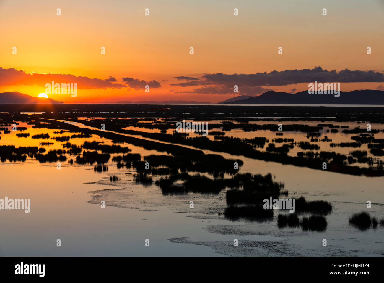 Peru, Titicaca lake, sunrise above the lake Stock Photo - Alamy