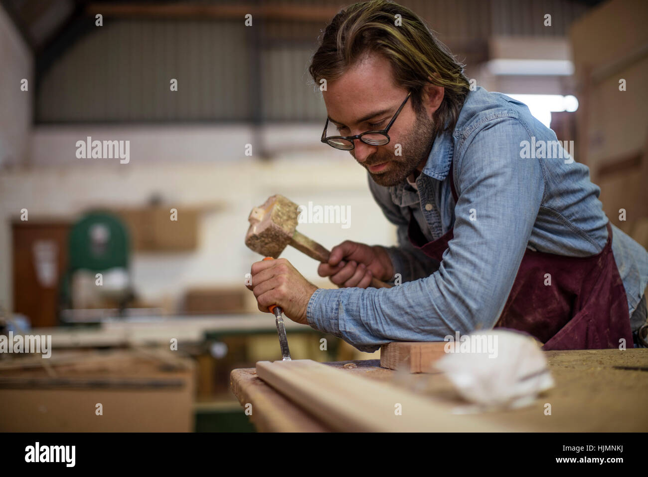 Craftsman working in wood work Stock Photo - Alamy