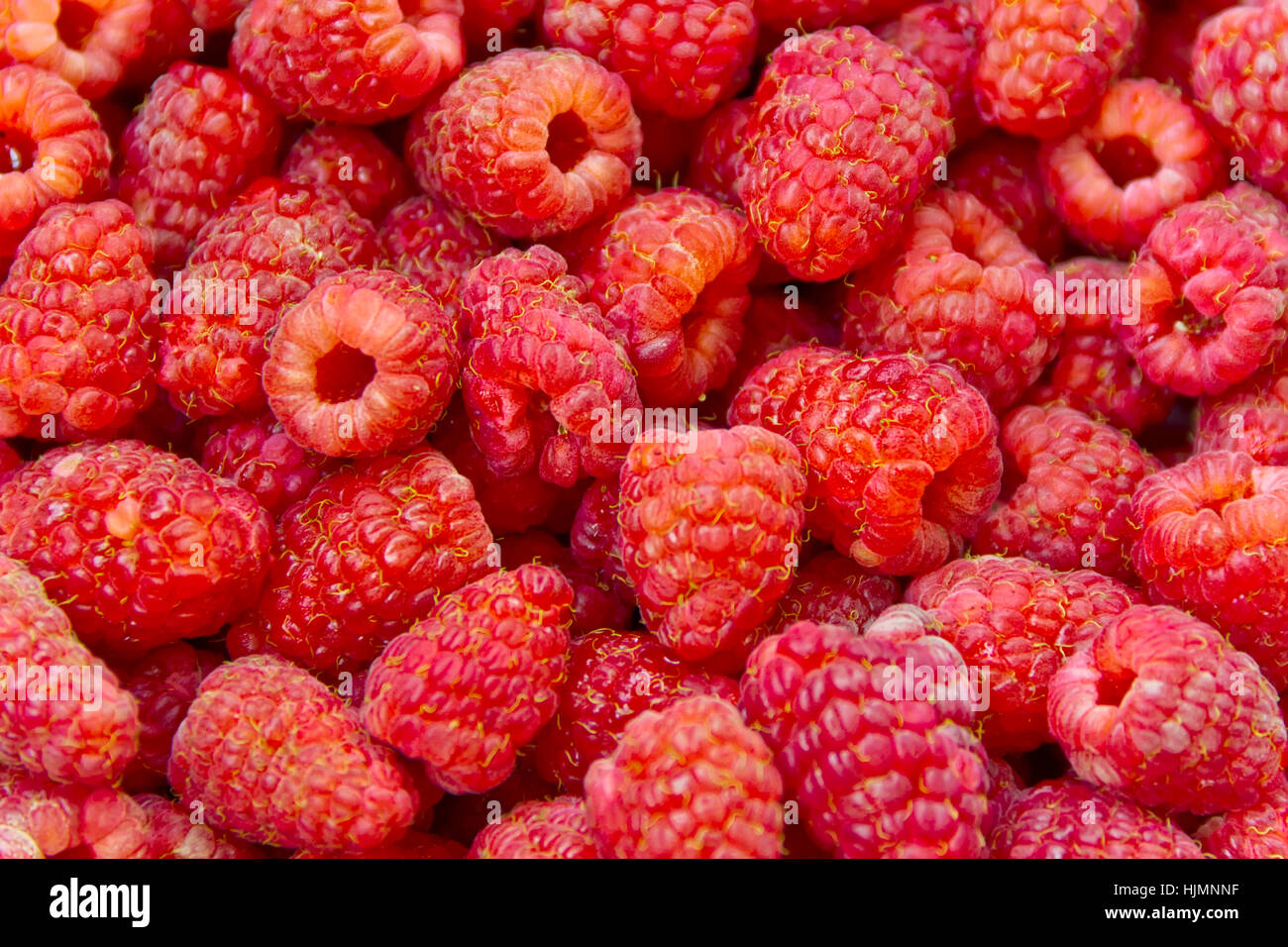Photo of the background fresh red raspberry Stock Photo - Alamy