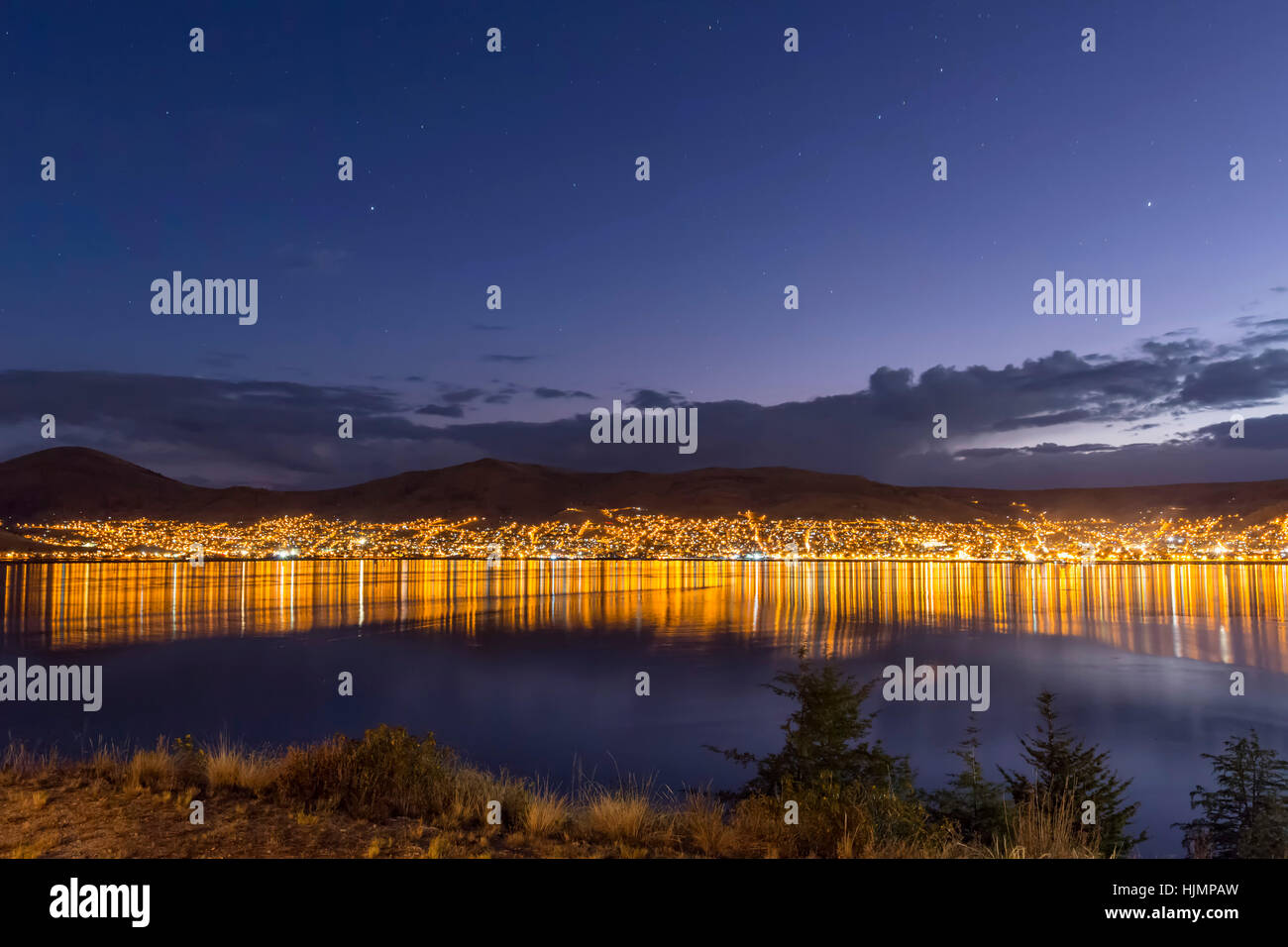 Peru, Titicaca lake, cityscape of Puno at blue hour Stock Photo - Alamy