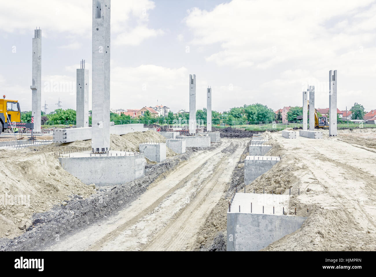 Tire tracks of large vehicles in dry ground on a building area ...