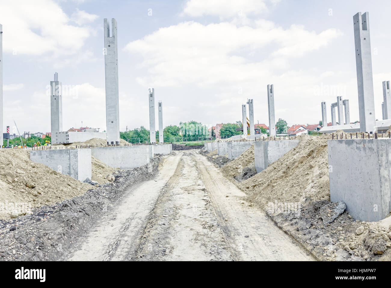Tire tracks of large vehicles in dry ground on a building area ...