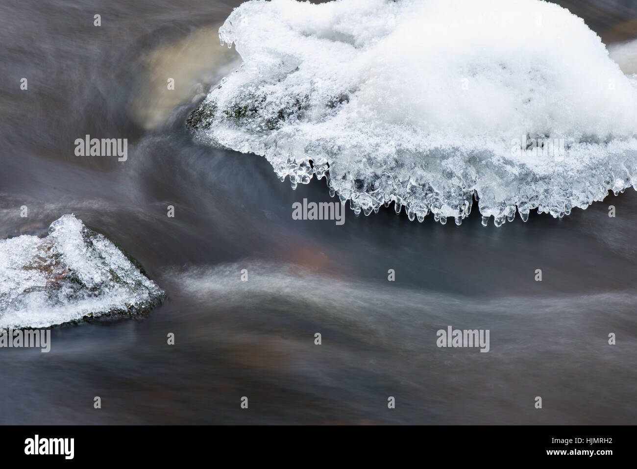 abstract frozen ice textures in the forest country river in winter ...