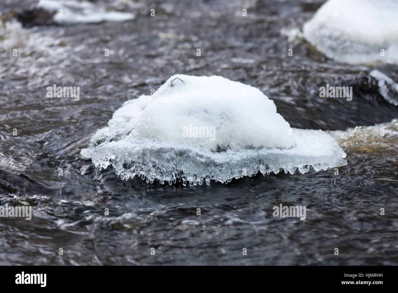 abstract frozen ice textures in the forest country river in winter ...