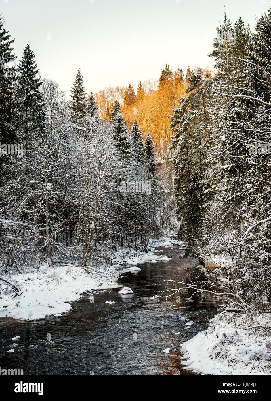 Frozen winter river landscape with ice and snow Stock Photo - Alamy