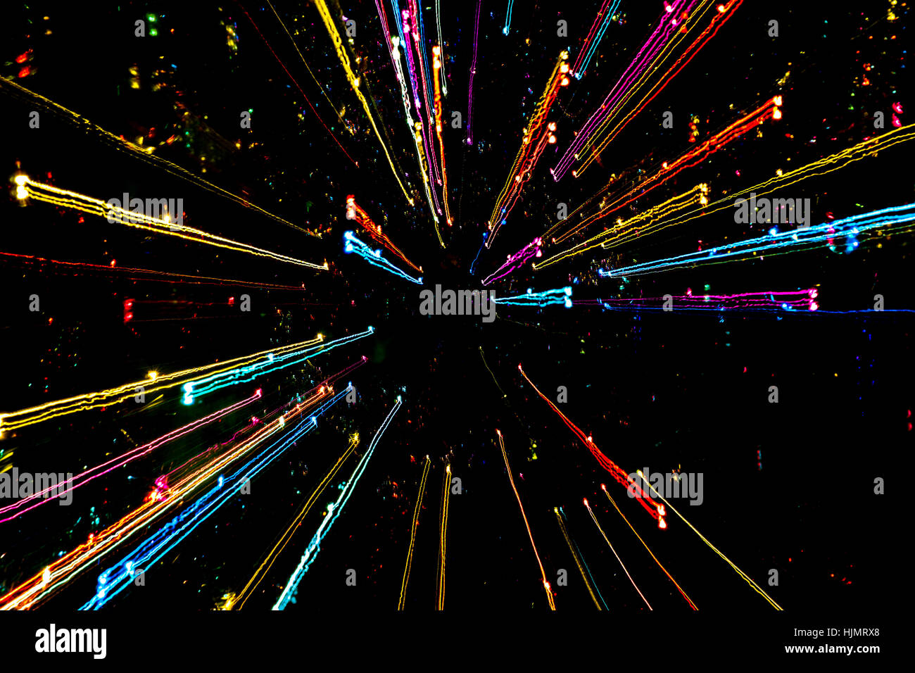 Multicolored luminous lines on black background Stock Photo - Alamy