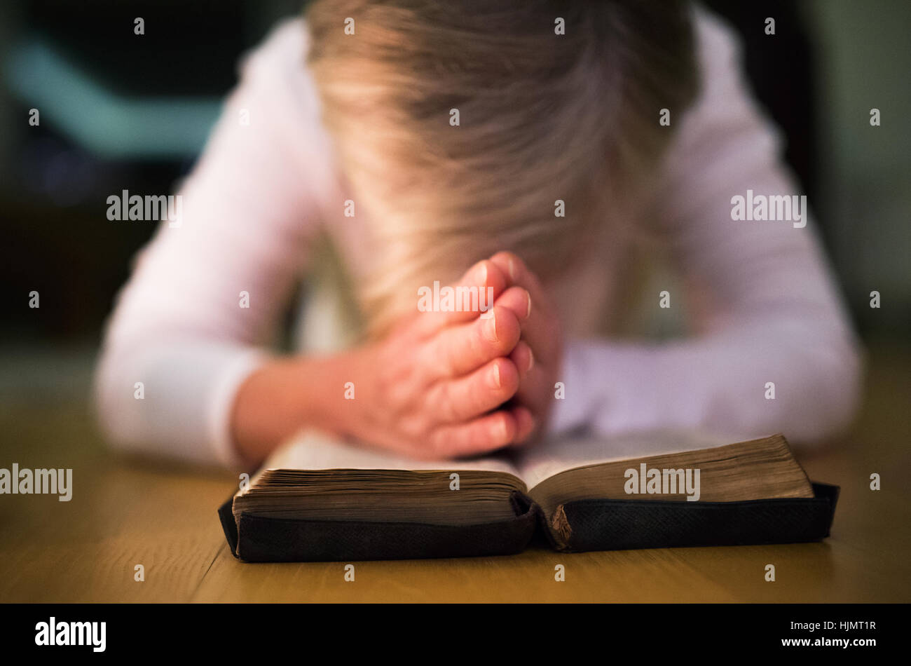 Woman praying hands hi-res stock photography and images - Alamy