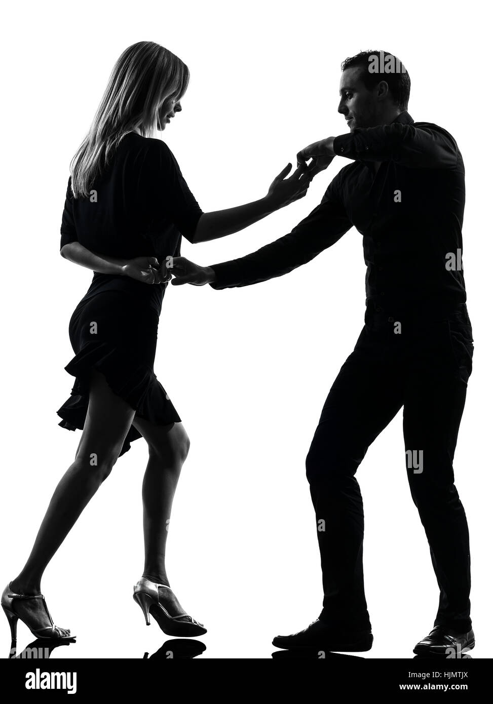 one caucasian couple woman man dancing dancers salsa rock in silhouette ...