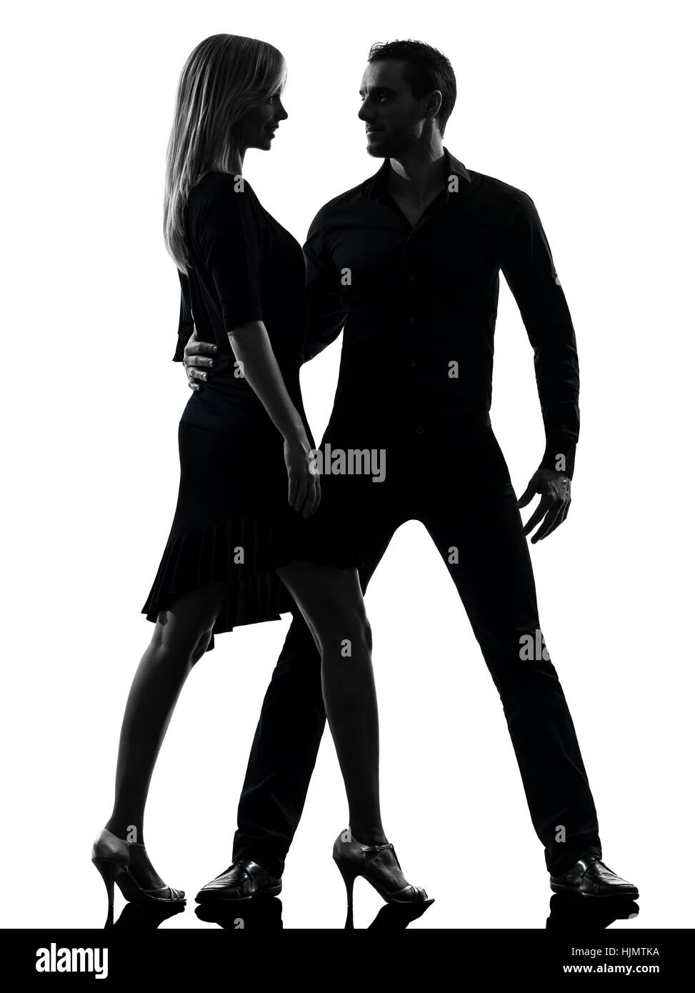 one caucasian couple woman man dancing dancers salsa rock in silhouette ...
