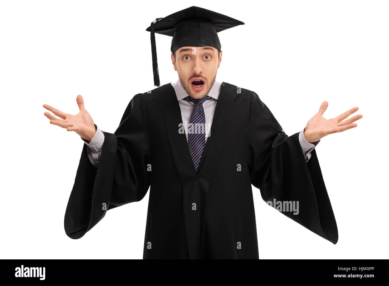 Shocked graduate student gesturing with his hands and looking at the ...