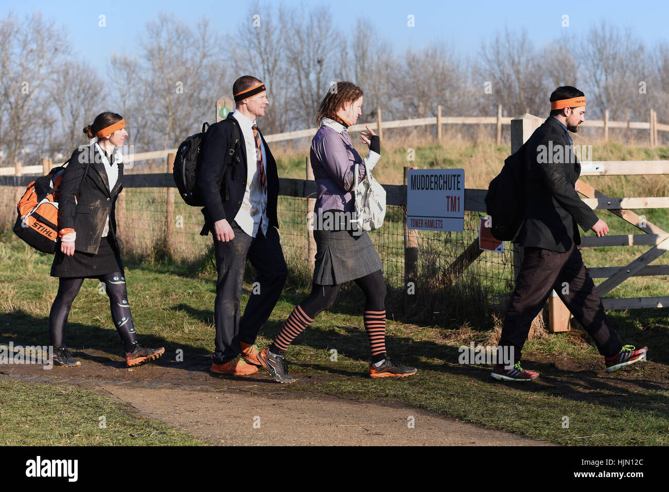Competitors dressed in suits arrive at Mudchute Park and Farm after ...