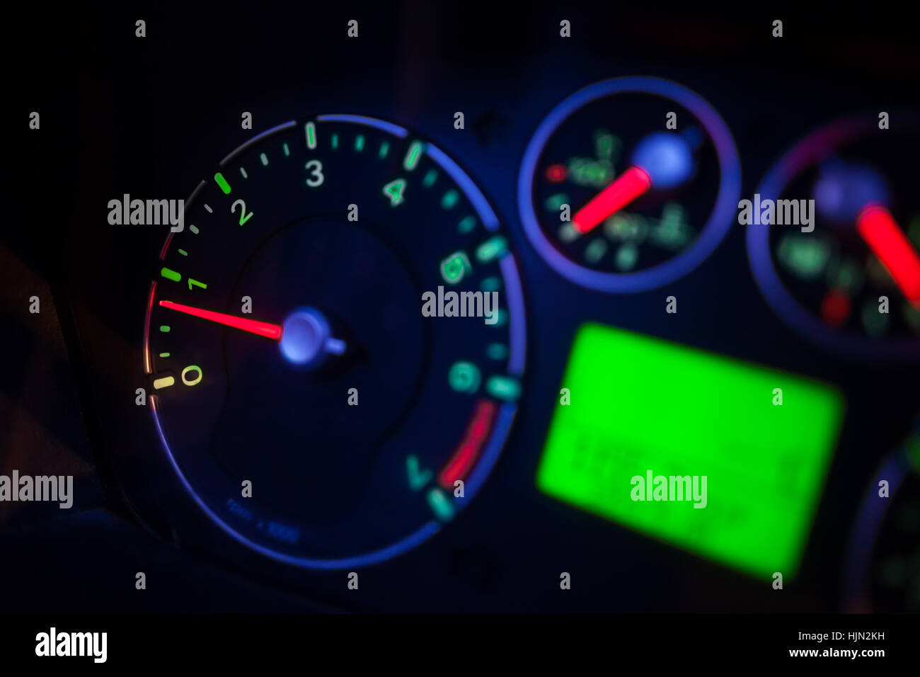 Close up shot of a car's illuminated dashboard, at night Stock Photo ...