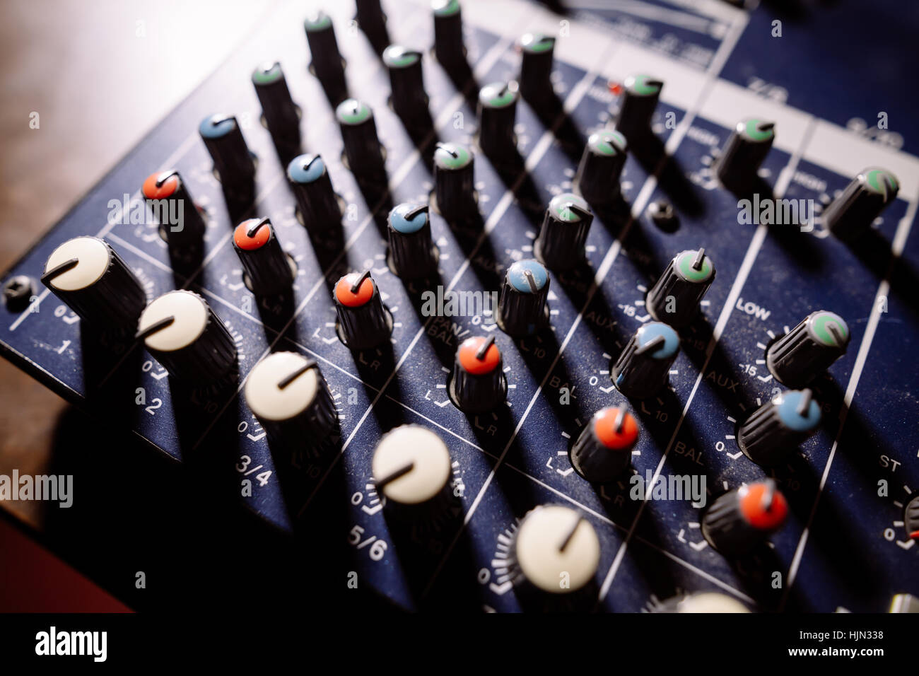 Close up shot of a mixer desk with many buttons Stock Photo - Alamy