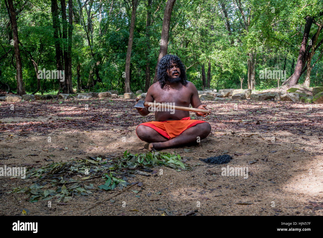 DABANA, SRI LANKA - CIRCA DECEMBER 2016: Vedda man holding axe. Veddas ...
