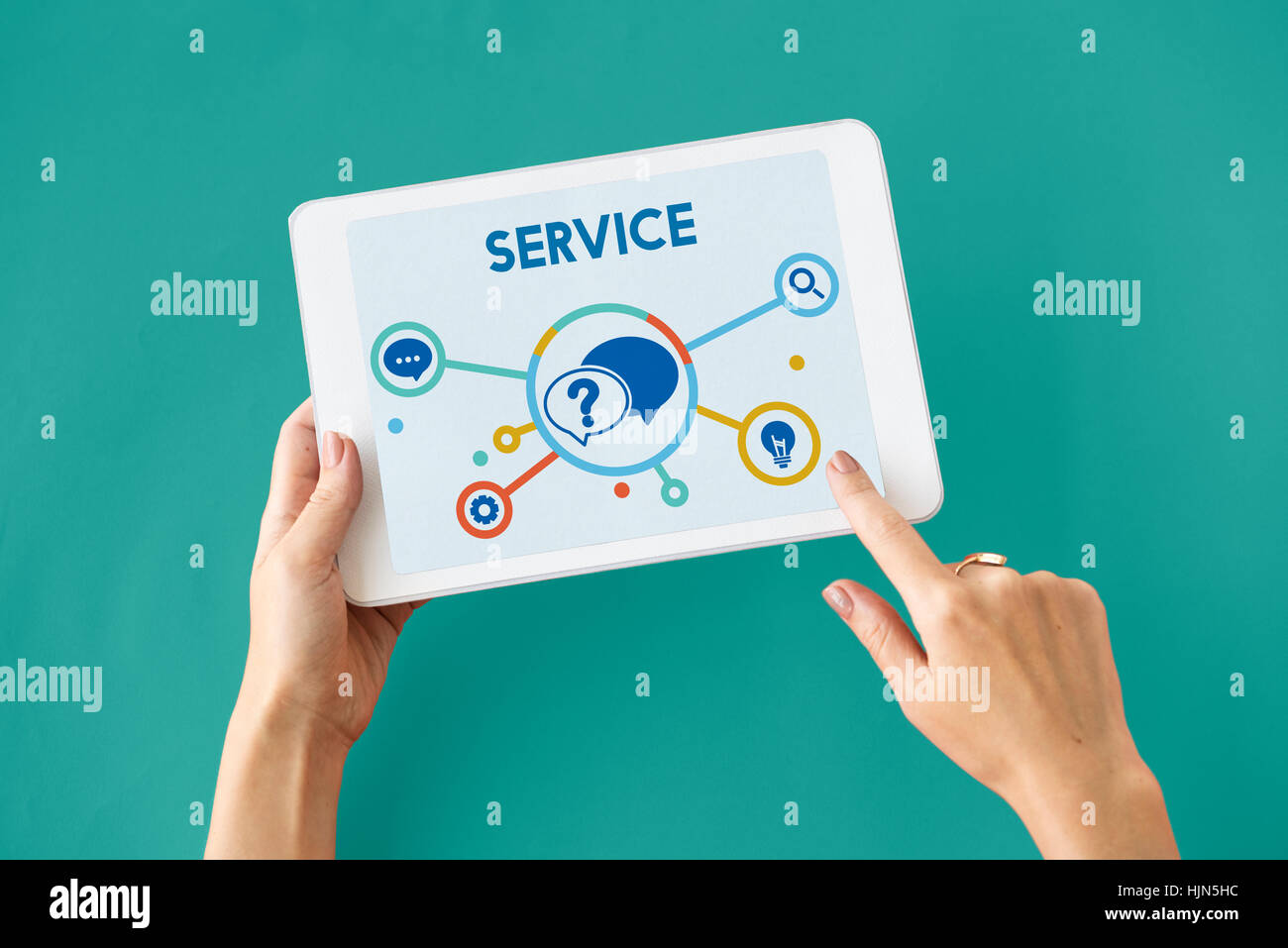 Hands hold tablet assistance hi-res stock photography and images - Alamy