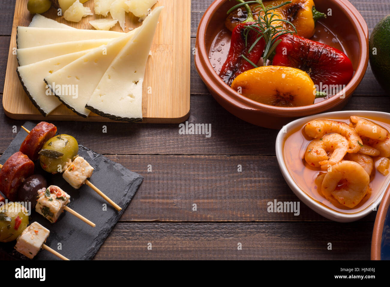 Top view of variety of mediterranean starters - spanish tapas with ...