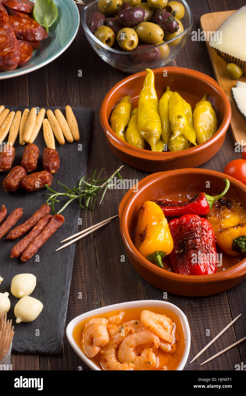 Top view of variety of mediterranean food starters - spanish tapas with ...